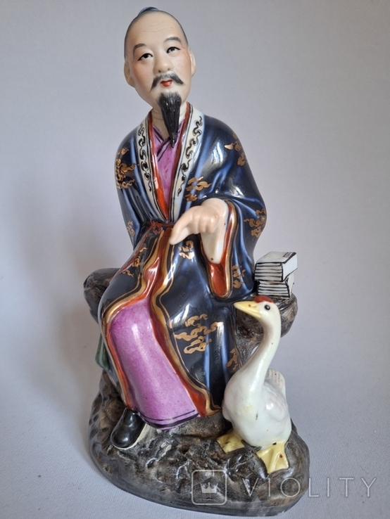 Porcelain figurine. A Chinese man with a goose. China. (116431316 ...